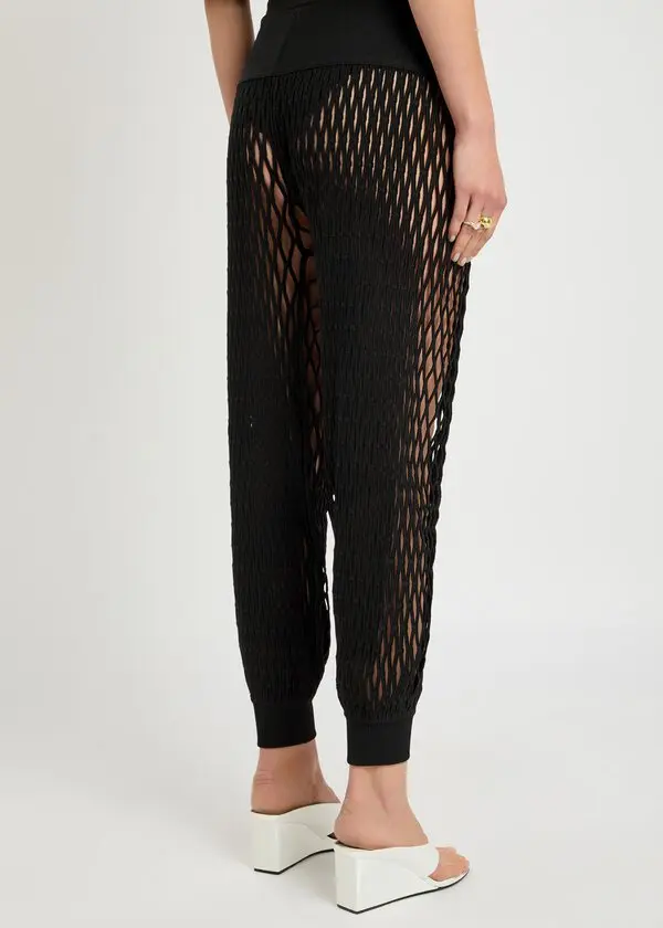 Alaïa Open-knit Stretch-jersey Trousers