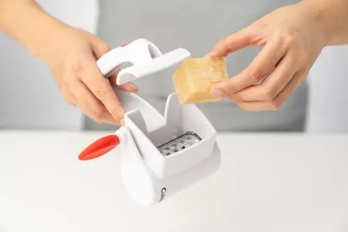 CUISIPRO Surface Glide Technology Rotary Dual Grater