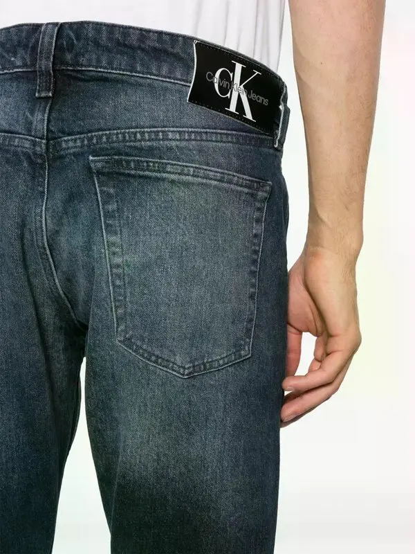 Calvin Klein Mid-rise Tapered-leg Jeans