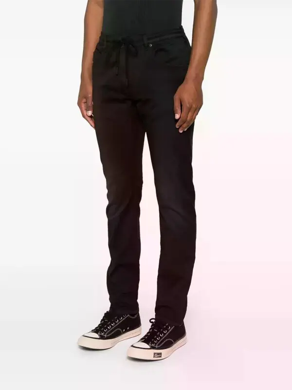 DIESEL® Logo-embroidered Tapered Jeans