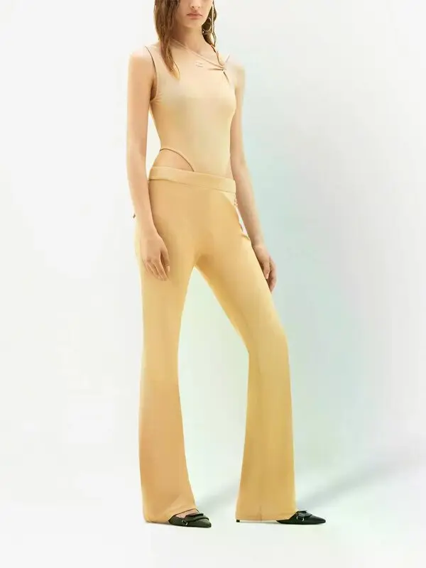 COURREGES Embroidered Logo Flared-leg Trousers - Neutrals