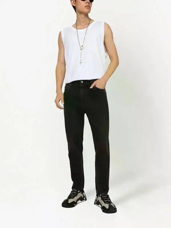 Dolce & Gabbana Tapered-leg Jeans With Logo Appliqu - Black