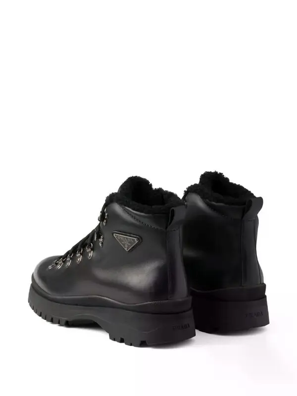 Prada Brixxen Leather Boots - Black