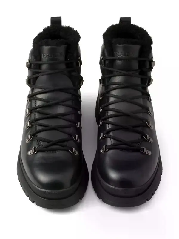 Prada Brixxen Leather Boots - Black
