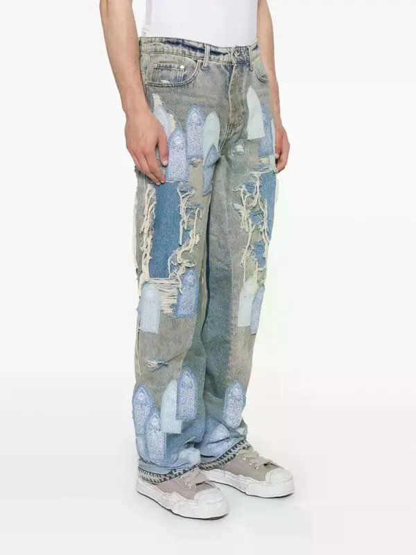 WHO DECIDES WAR Patched Arch Repaired Blowout Jeans - Denim