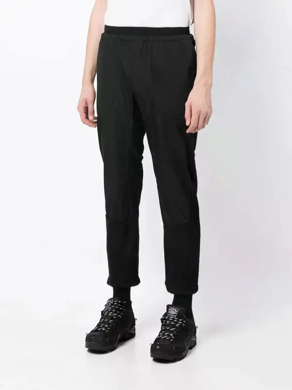 AND WANDER Fleece-panel Trousers