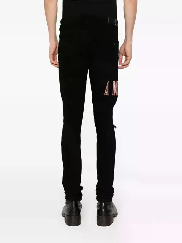Amiri Waxed Logo-appliqué Skinny Jeans