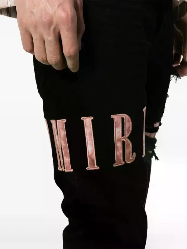 Amiri Waxed Logo-appliqué Skinny Jeans