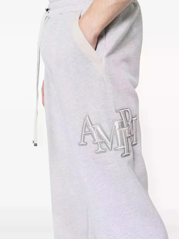 Amiri Staggered Logo-embroidered Track Pants