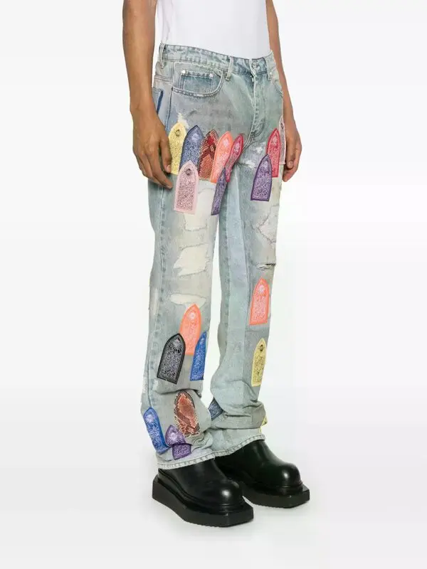 WHO DECIDES WAR Patch Arched Distressed Jeans