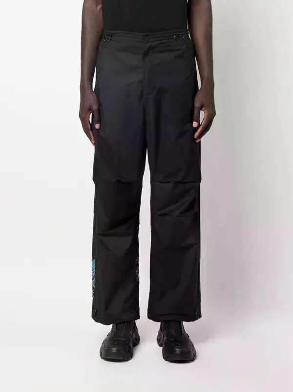 MAHARISHI Graphic-print Trousers