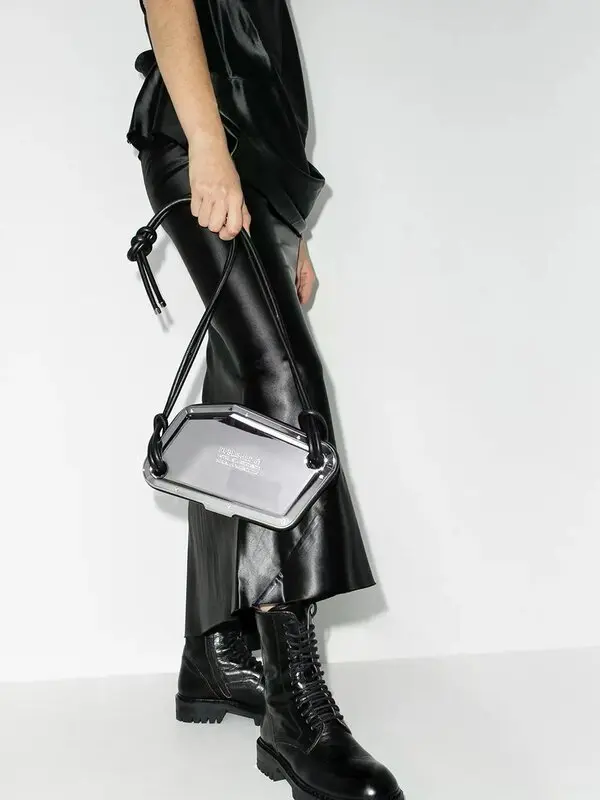 PUBLISHED BY Engraved-logo Crossbody Bag
