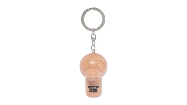 A BATHING APE Baby Milo Kokeshi Doll Keychain - Beige