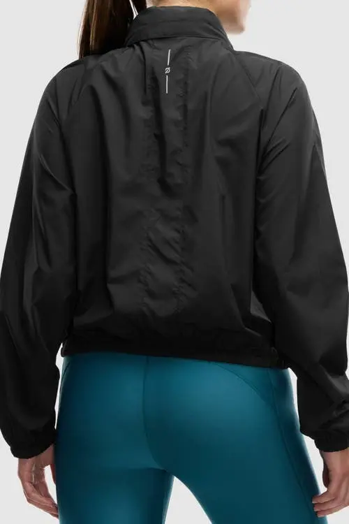PELOTON Woven Seamed Run Shell - Black