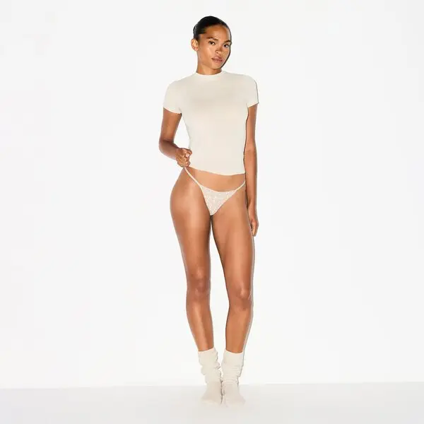 SKIMS String Thong | White | Medium | Lightweight Cotton - Delta Leopard