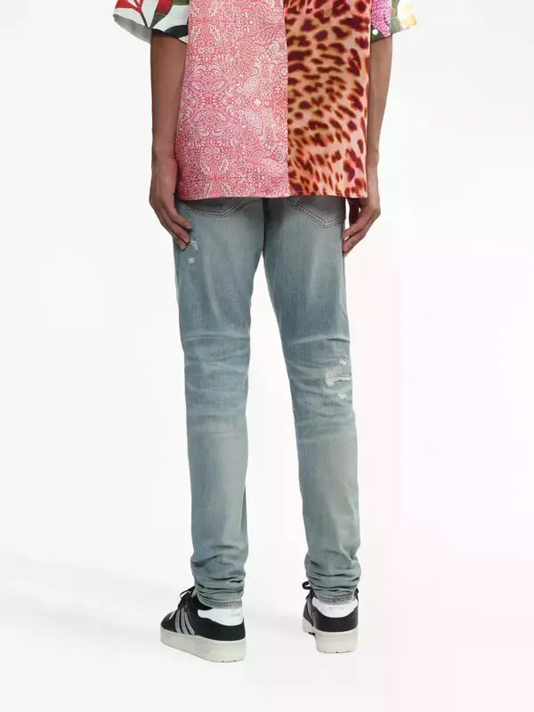 Amiri Logo-print Distressed Jeans