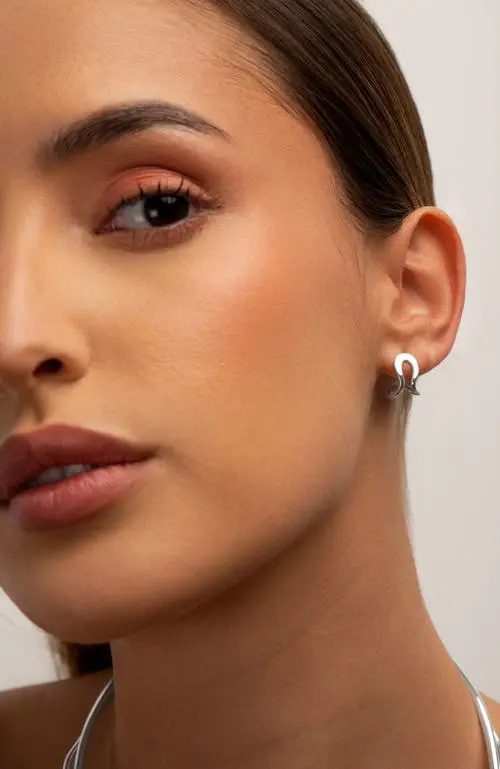 PIERETTI Cochi Huggie Earrings - Silver Plate