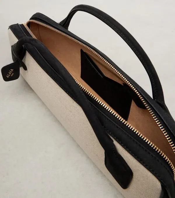 Alaïa Le Teckel Canvas Clutch - White