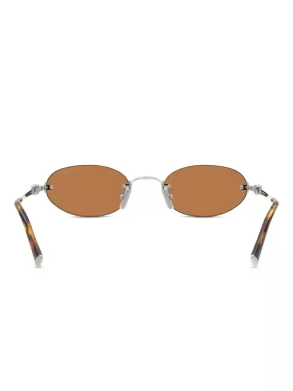 Miu Miu Oval Rimless Sunglasses