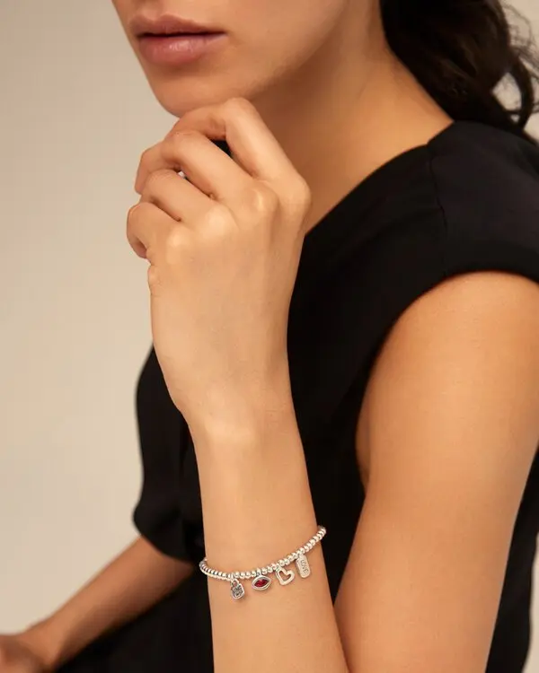 UNODE50 Sterling -plated Beaded Charm Bracelet With Red Stone