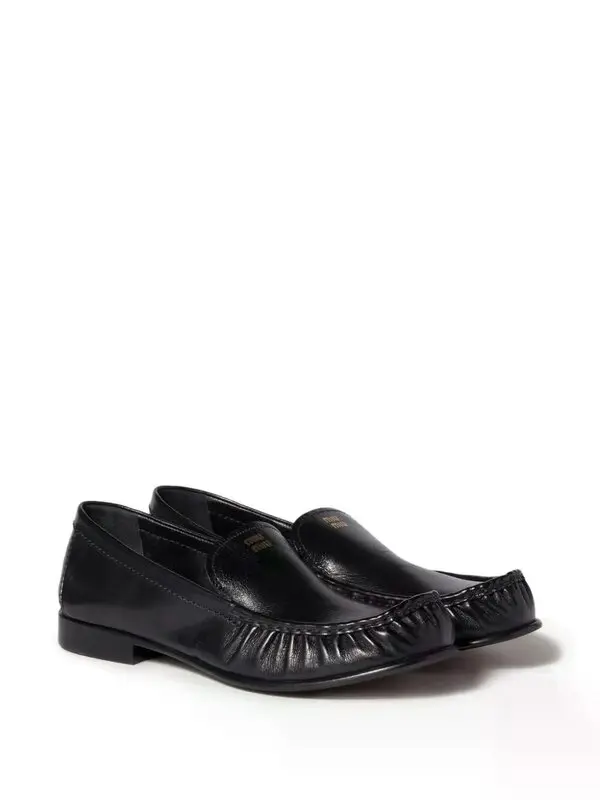 Miu Miu Embossed-logo Loafers