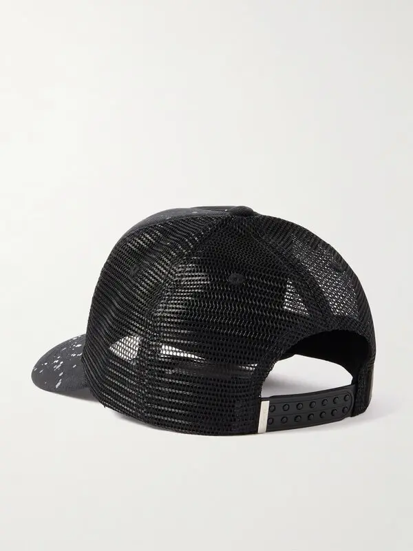 Amiri black baseball cap with paint splash print Amiri Paint Drip Core Logo Trucker in Black | FWRD main image 2