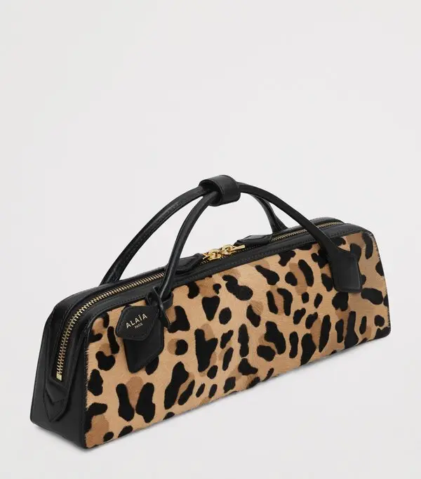 Alaïa Leather Leopard Print Le Teckel Clutch - Brown