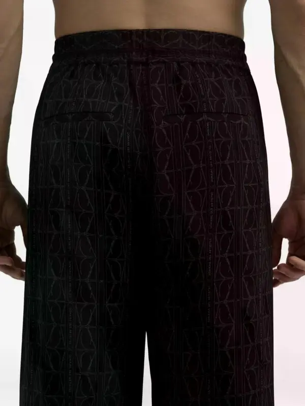 DOMAINE DES ARTISTES Lion-embellished Patterned Trousers - Black