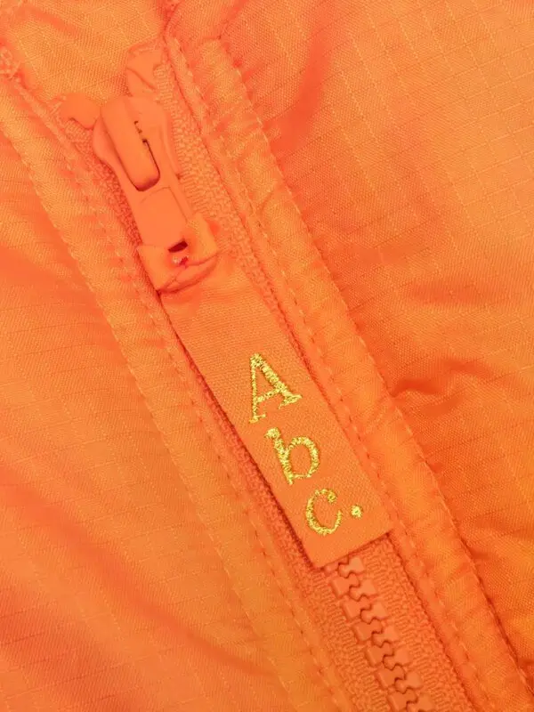 ADVISORY BOARD CRYSTALS Quilted Puffer Vest