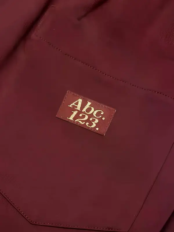 ADVISORY BOARD CRYSTALS Logo-patch Trousers - Red
