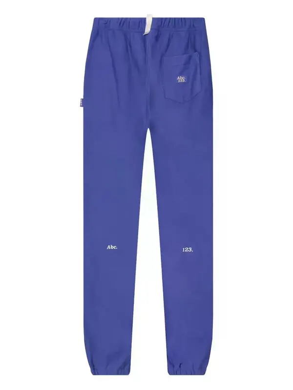 ADVISORY BOARD CRYSTALS Logo-plaque Track Pants - Blue