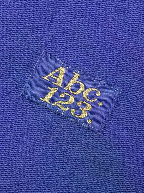 ADVISORY BOARD CRYSTALS Elasticated-waist Logo-patch Trousers - Blue