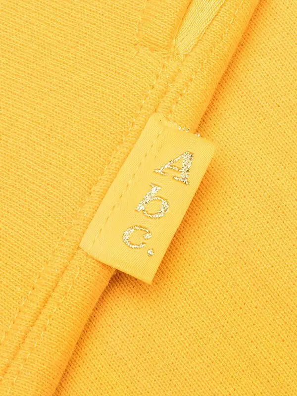 ADVISORY BOARD CRYSTALS Sphene Embroidered-number Track Pants - Yellow
