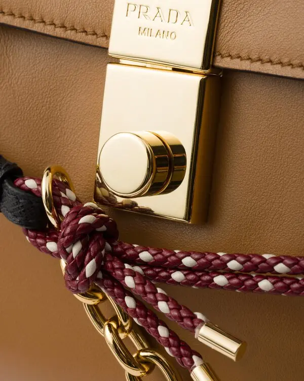Prada Large Leather Shoulder Bag With Charms - Brown