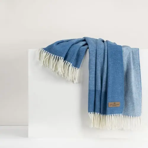 LANDS DOWNUNDER Border Herringbone Throw - Azure