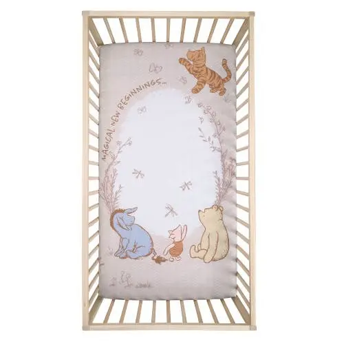 LAMBS & IVY Disney Baby Pooh Bear & Pals Photo Op Cotton Baby Fitted Crib Sheet - Cream
