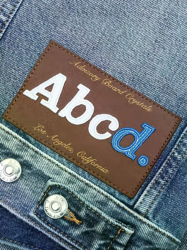 ADVISORY BOARD CRYSTALS Shearling-lined Denim Jacket
