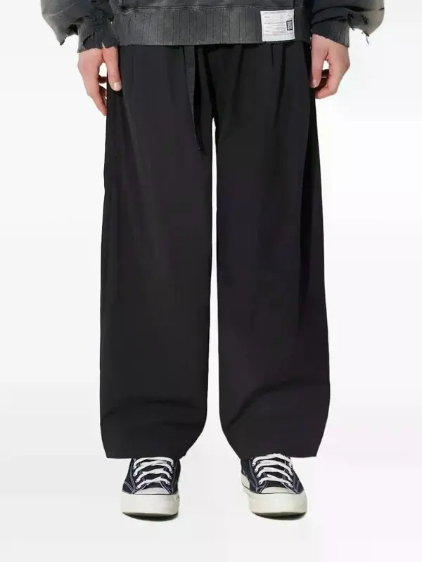 MANASTASH Zip-pocket Trousers