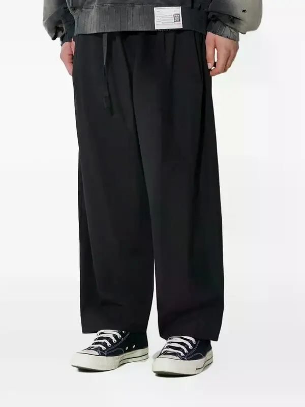 MANASTASH Zip-pocket Trousers