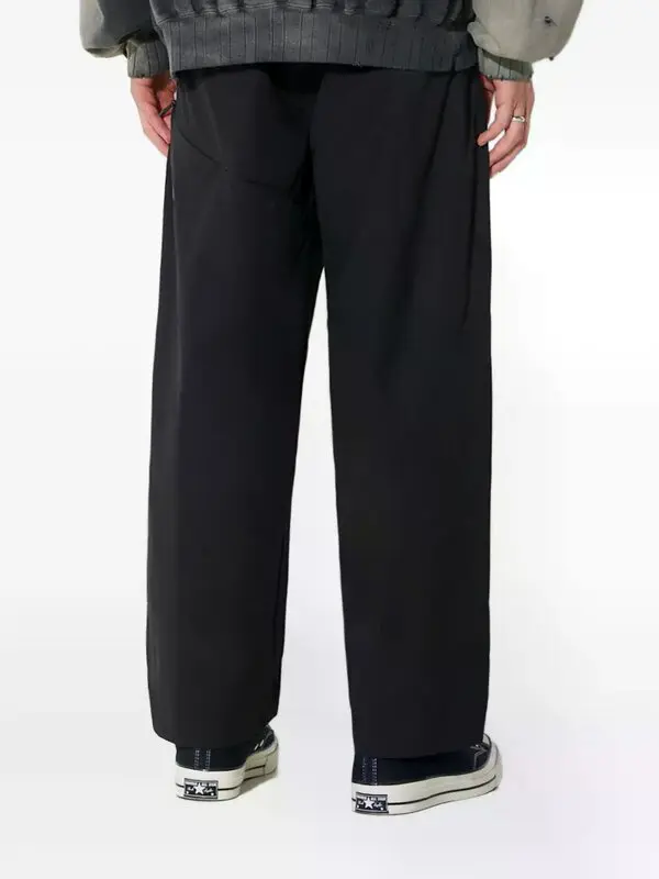 MANASTASH Zip-pocket Trousers