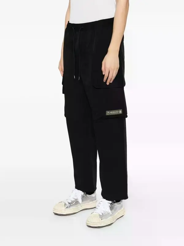 FINGERCROXX Slogan-patch Trousers