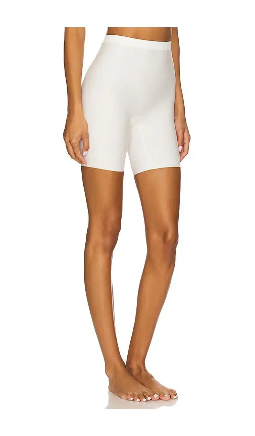 Spanx Shape Invisible Supima Cotton Mid Thigh Short In Cream - Powder