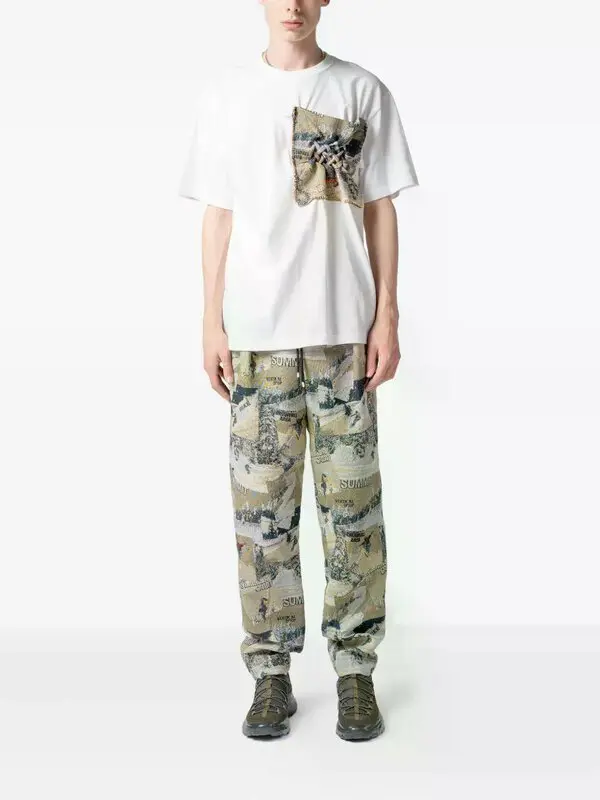 YOSHIOKUBO Graphic Print Trousers