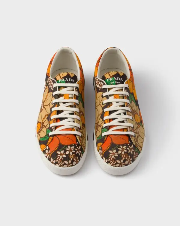 Prada Laced Floral Print Canvas Sneakers - Ebony | Editorialist display picture 1