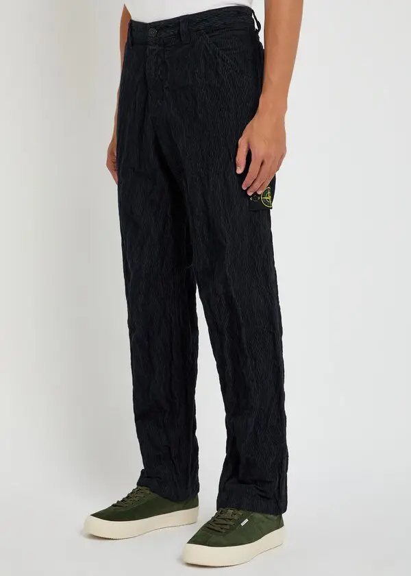 Stone Island Crinkled Tapered-leg Corduroy Trousers - Navy