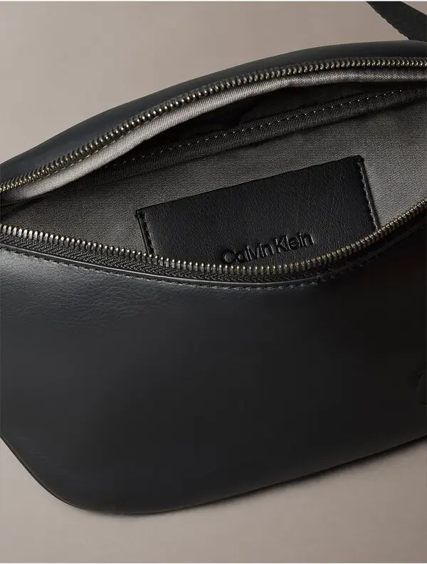 Calvin Klein Embossed Monogram Belt Bag