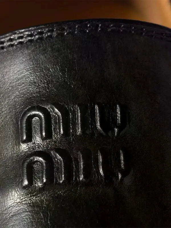 Miu Miu Embossed Logo Leather Loafers - Black