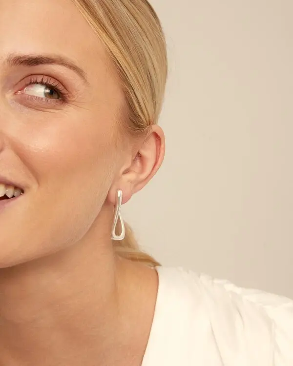 UNODE50 Wave Hoop Earrings - Silver