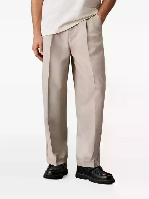 Calvin Klein Pleated-front Trousers With Cuffed Hem