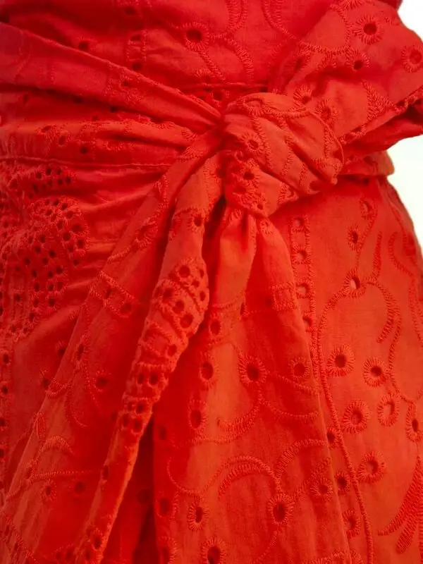 NEVER FULLY DRESSED Eyelet-embroidered Wrap Midi Skirt